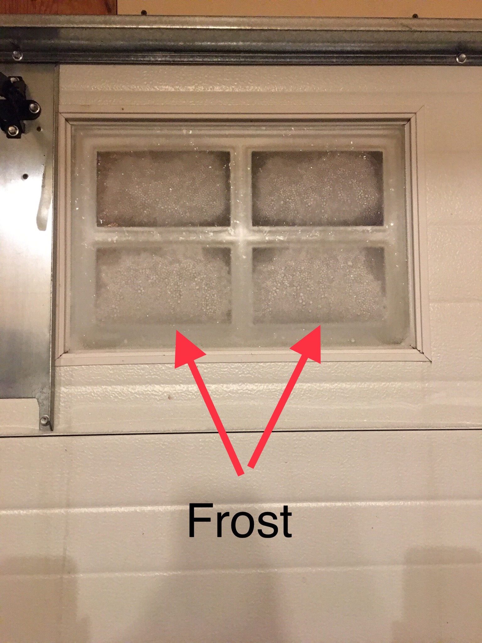 Frost on garage OHD, wall, grade beam or mold on garage drywall?